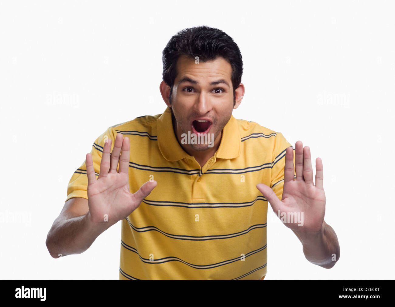 Portrait of a man showing stop gesture Stock Photo - Alamy