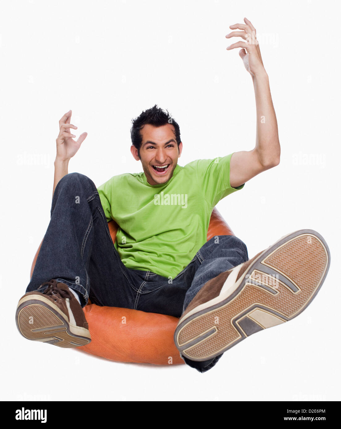 Man sitting on bean bag Cut Out Stock Images & Pictures - Alamy