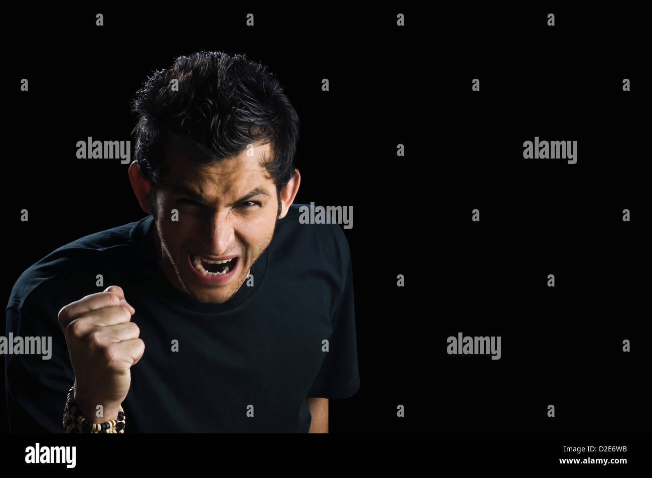 Portrait of a man looking angry Stock Photo - Alamy