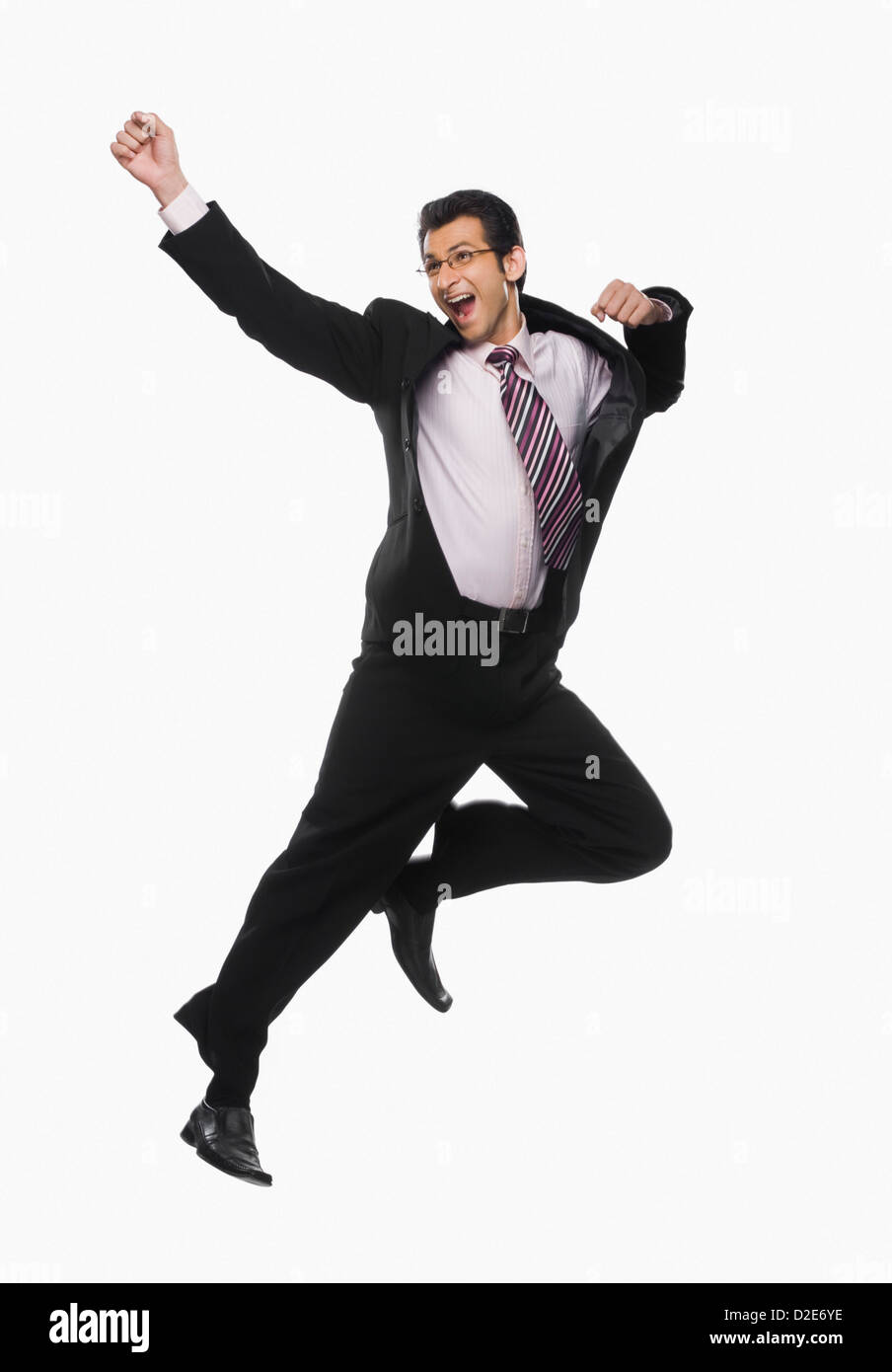 Man suit jumping of hi-res stock photography and images - Alamy