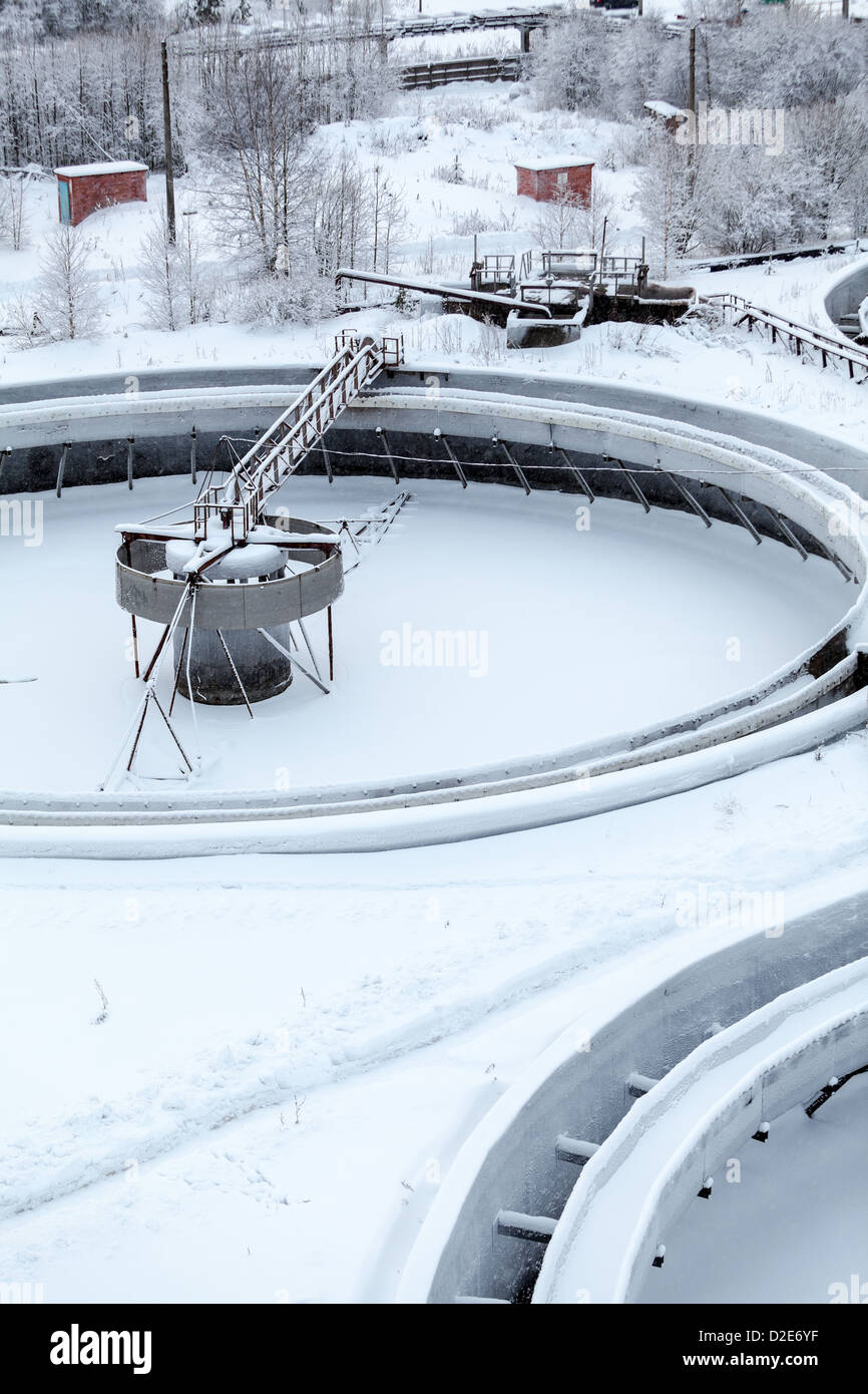 Snow-covered empty round settlers in sewerage treatment plant Stock ...
