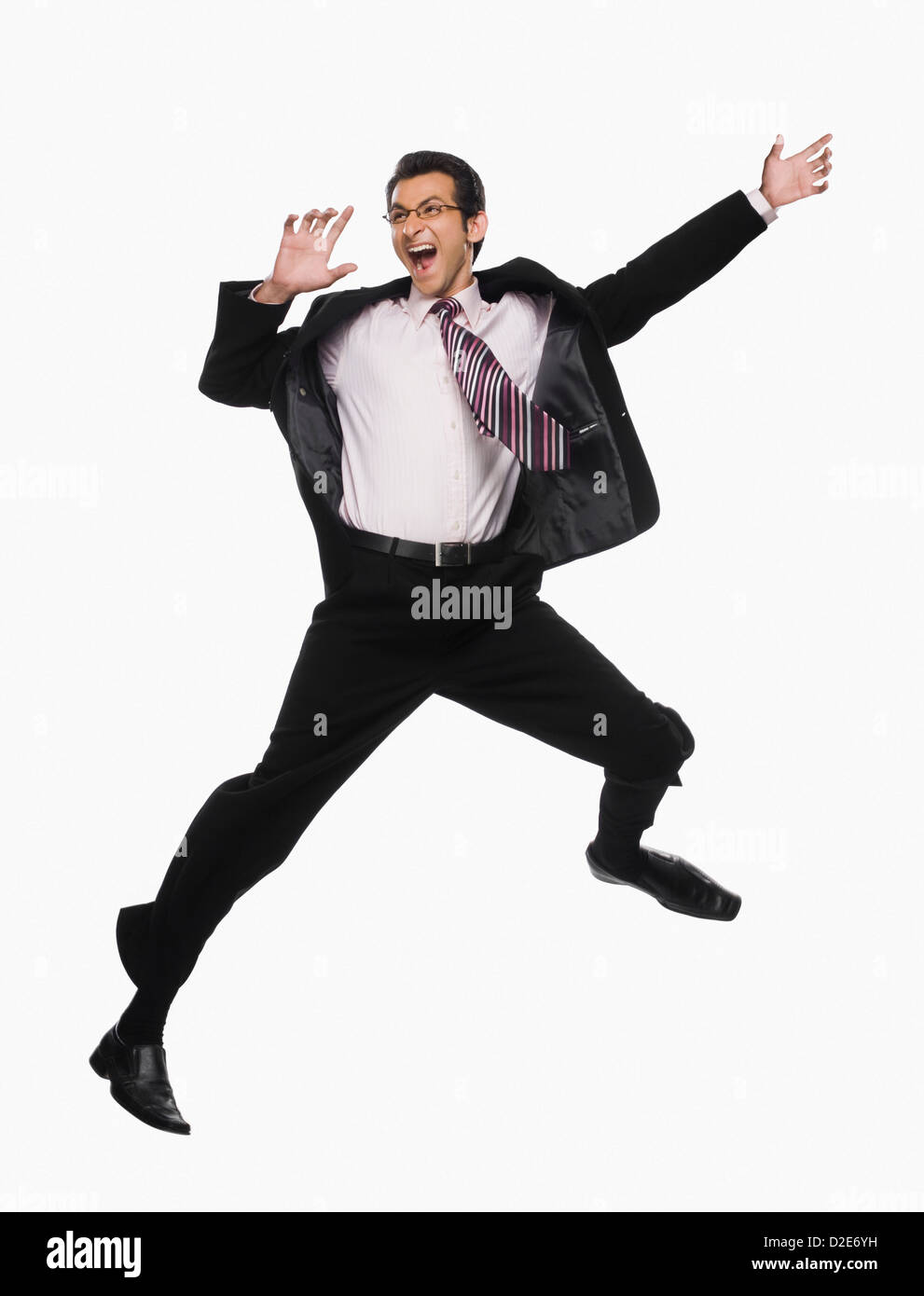 Ecstatic businessman jumping Cut Out Stock Images & Pictures - Alamy