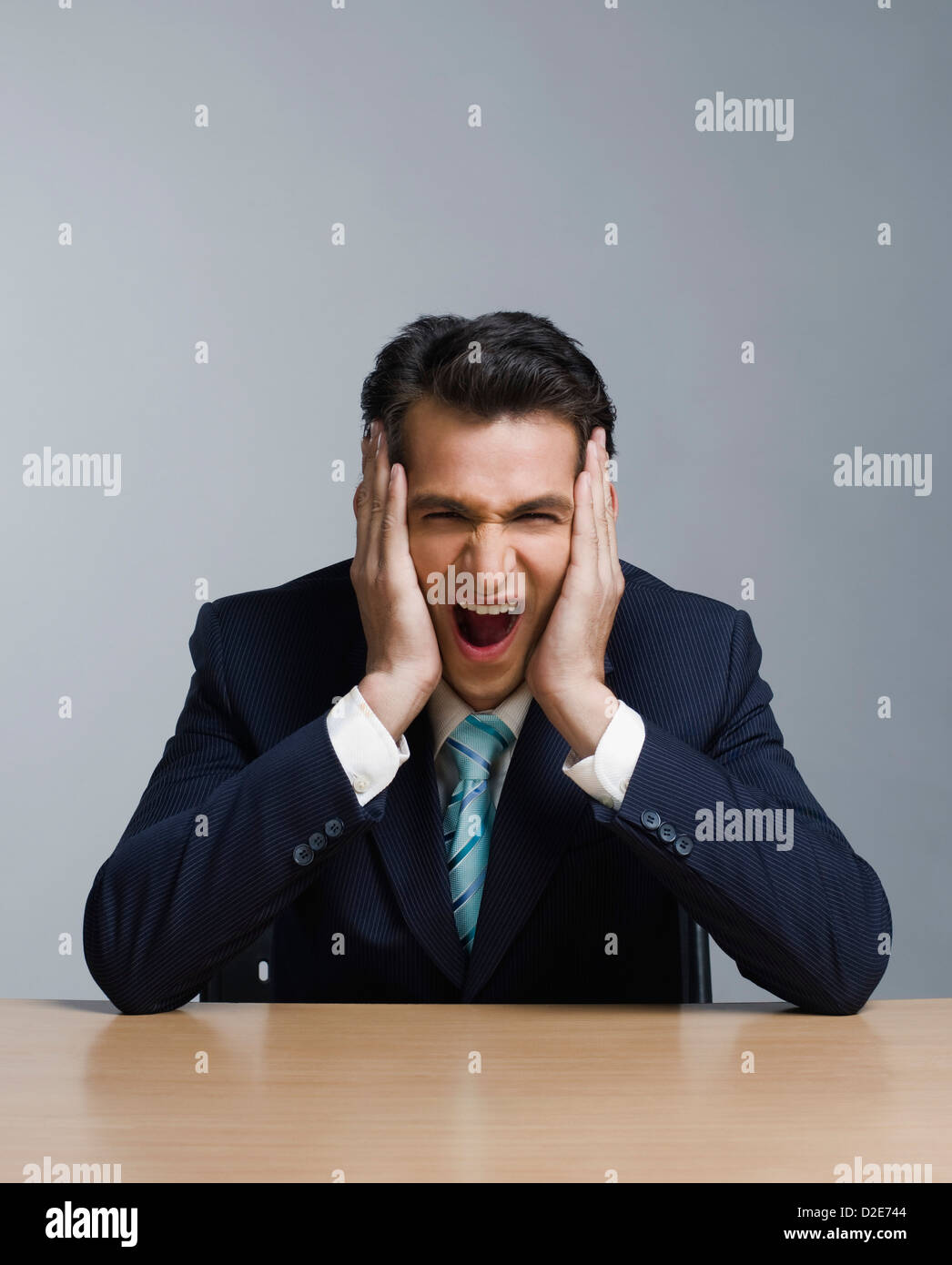 Close-up of a businessman screaming Stock Photo - Alamy