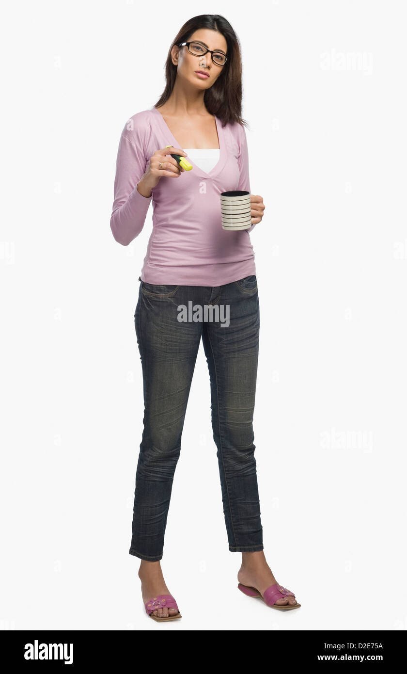 Female fashion designer drinking coffee Stock Photo - Alamy