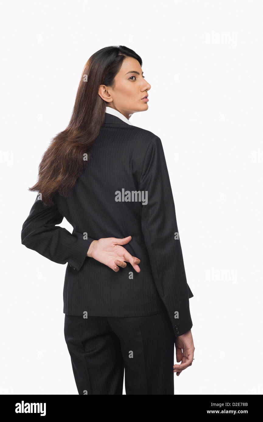Standing gesturing hands behind back communication hi-res stock ...