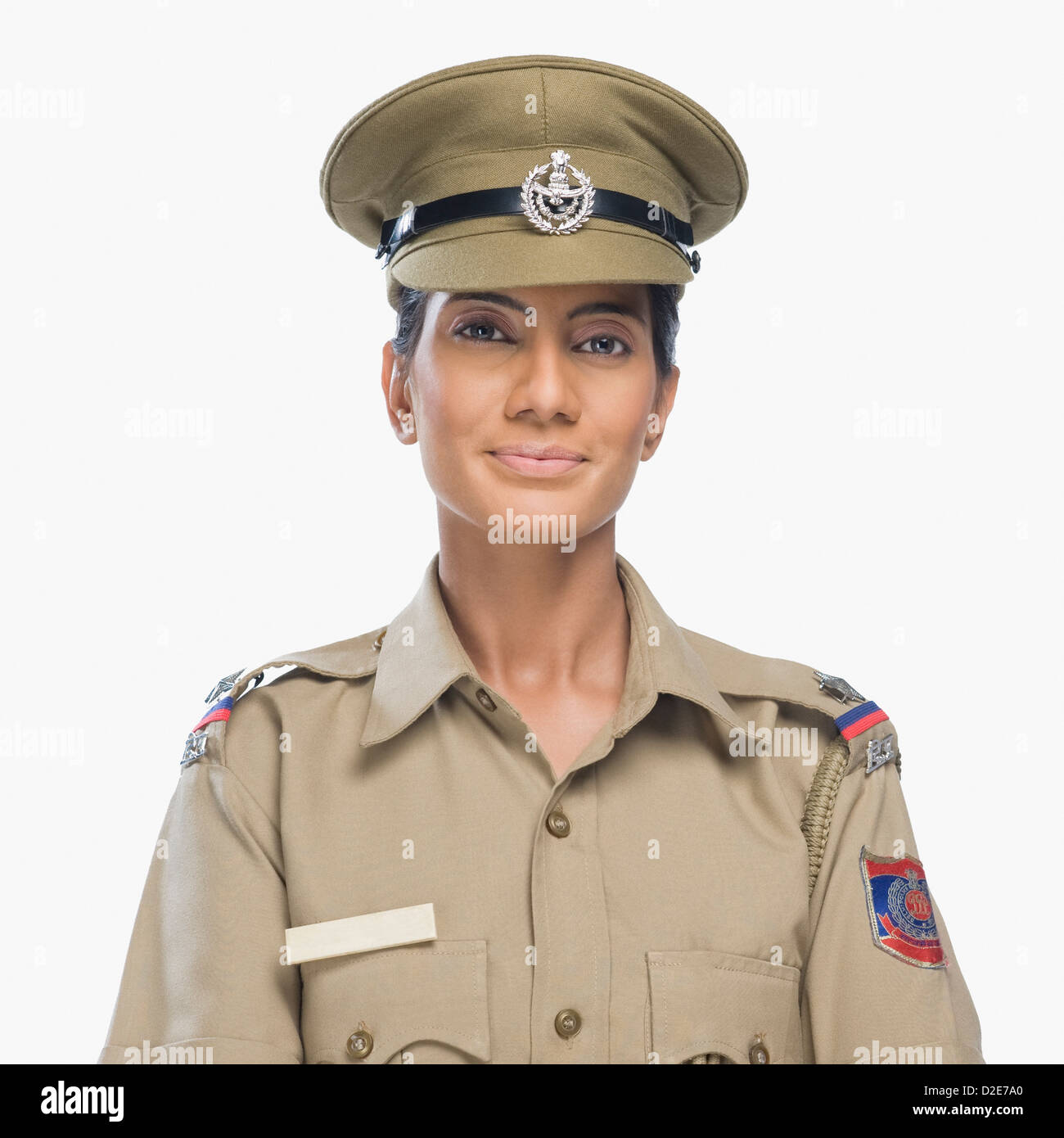 Female police officer smiling Stock Photo - Alamy