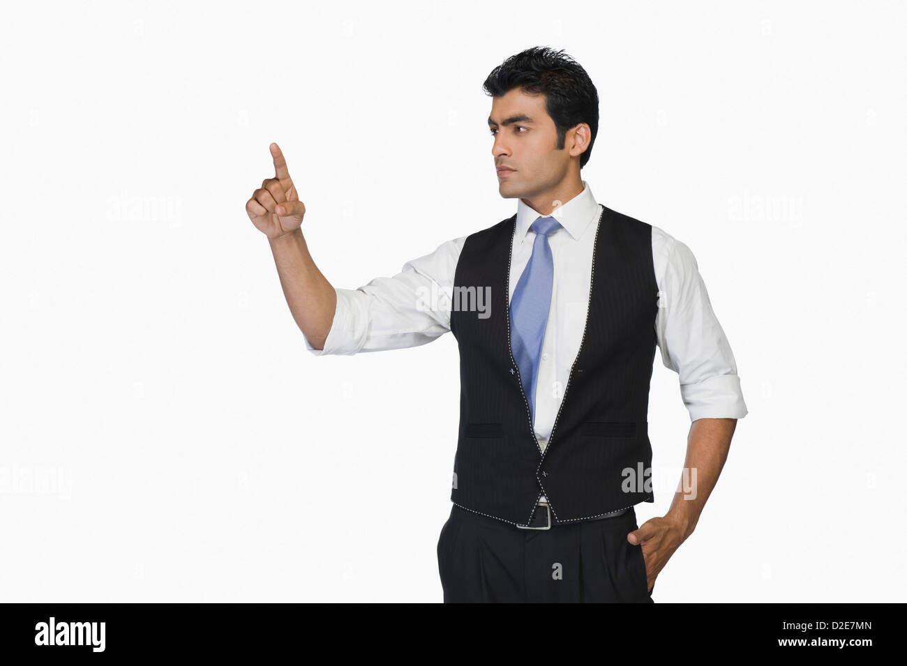 Businessman pointing with his finger Stock Photo - Alamy
