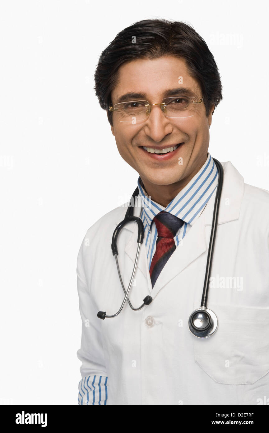 Portrait of a doctor smiling Stock Photo - Alamy