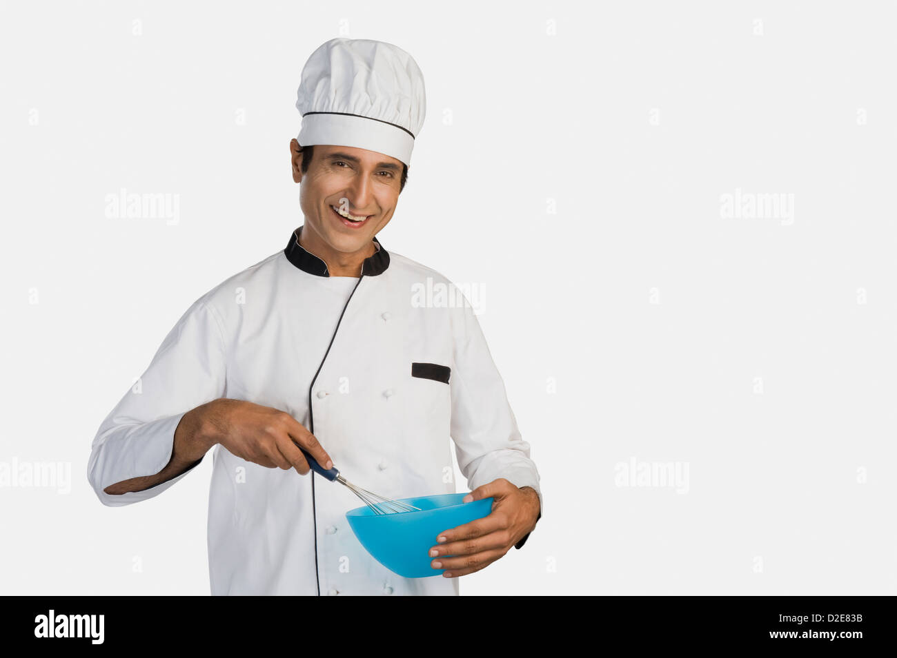 Portrait of a chef holding a mixing bowl Stock Photo - Alamy