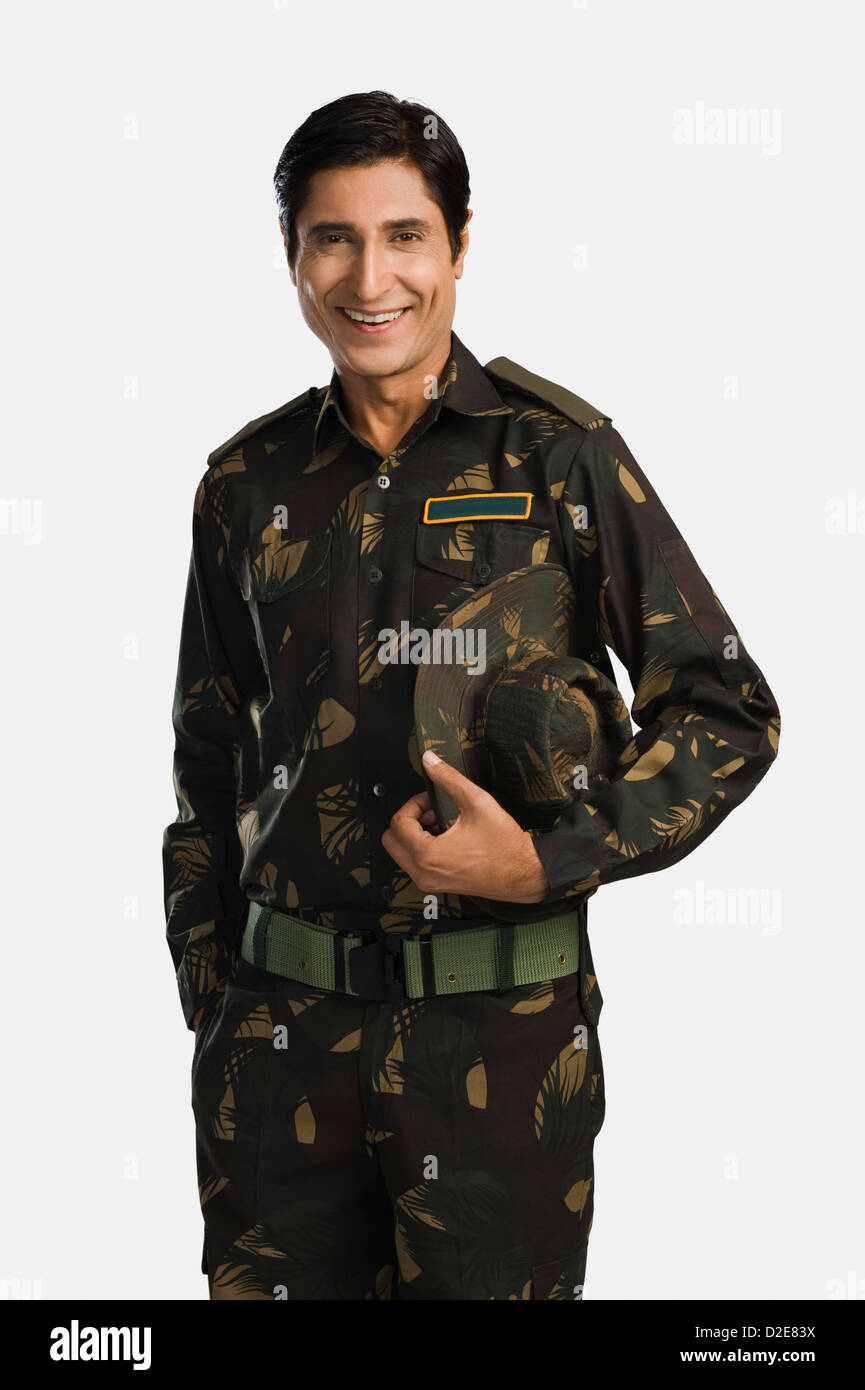 Portrait of an army soldier smiling Stock Photo - Alamy