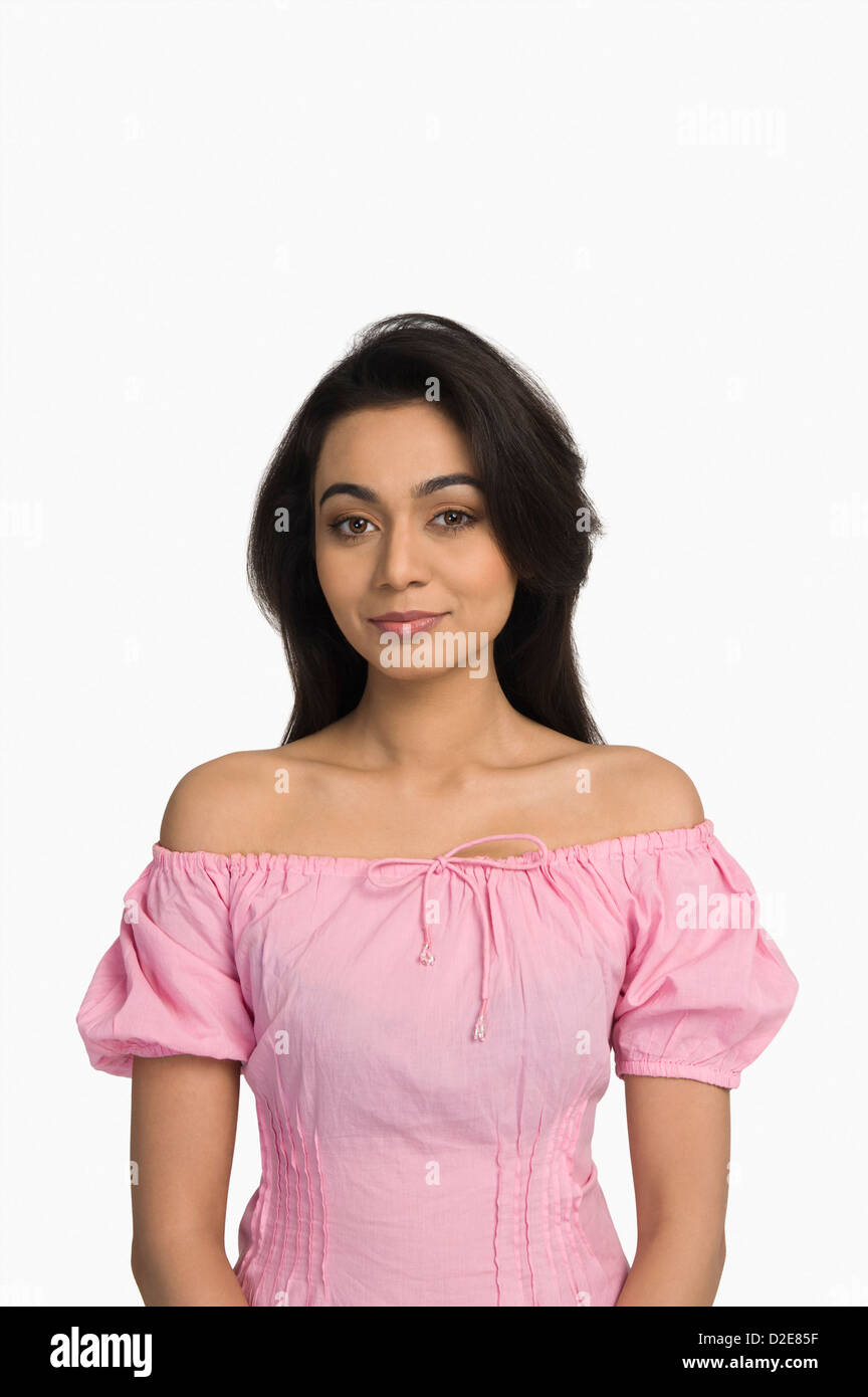 Portrait of a woman smirking Stock Photo - Alamy