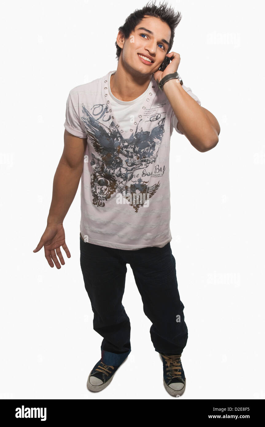 Smiling man phone conversation on Cut Out Stock Images & Pictures - Alamy