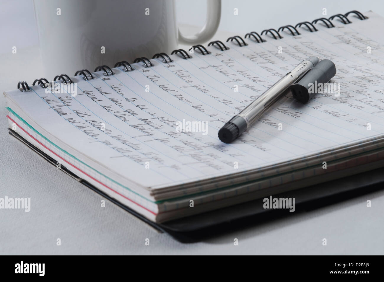 Close-up of a pen on an open notebook Stock Photo - Alamy