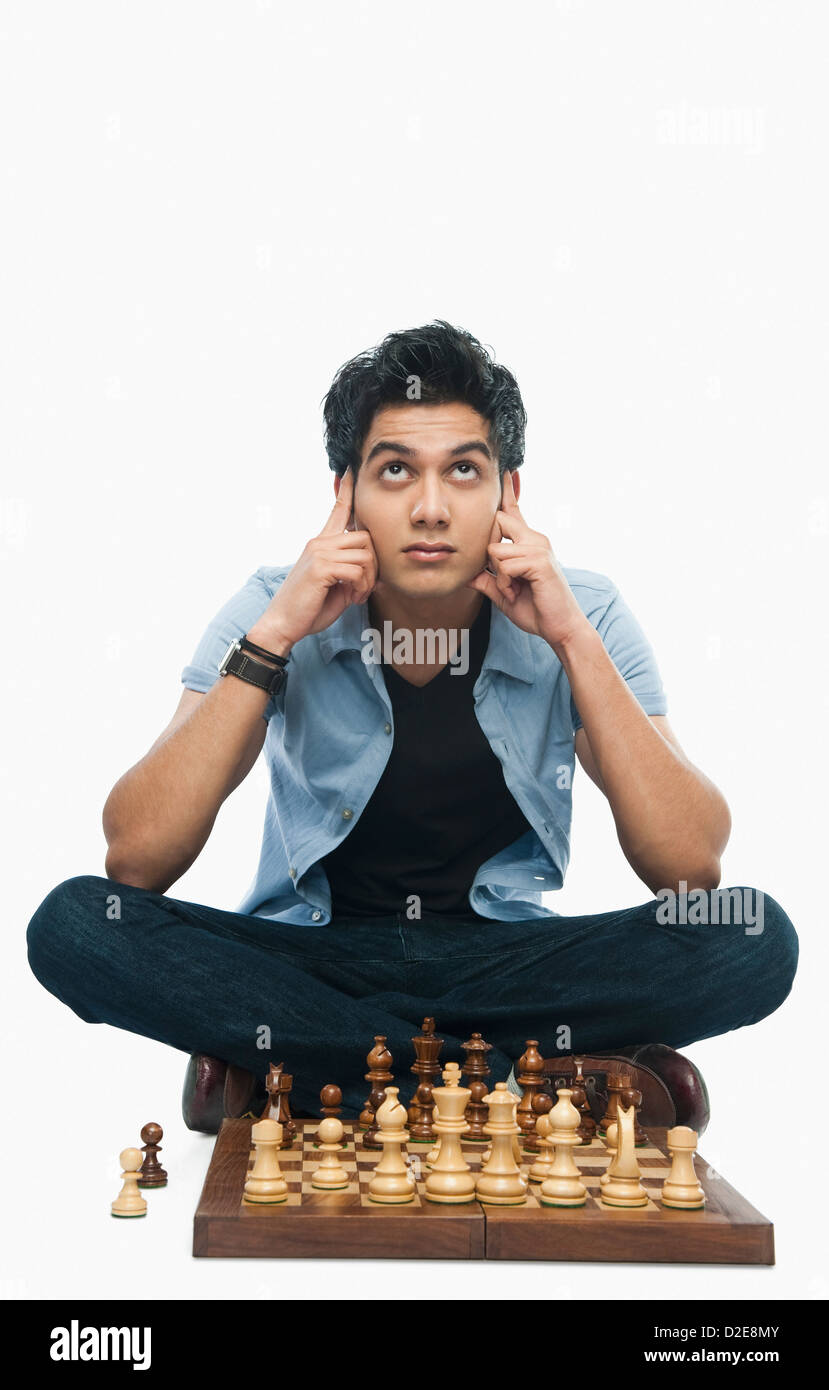 Man playing chess Stock Photo - Alamy