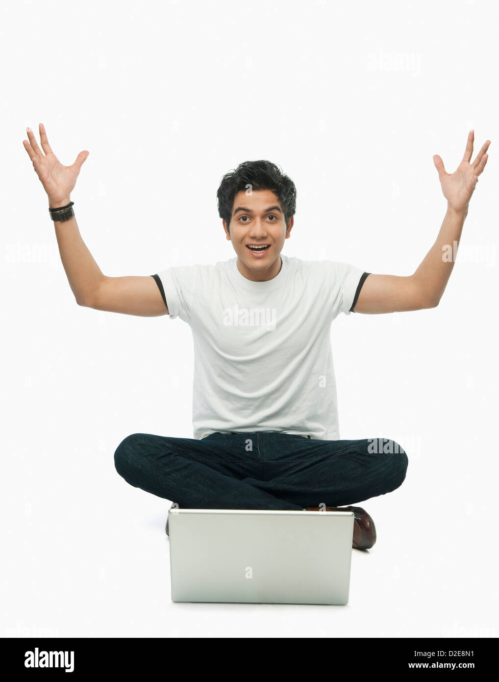 Indian man raising arms Cut Out Stock Images & Pictures - Alamy