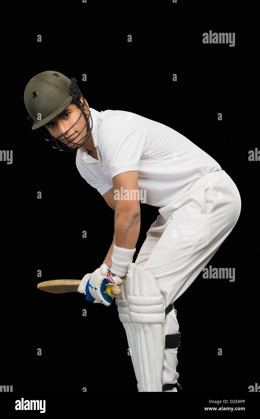 Cricket batsman playing cricket Stock Photo - Alamy