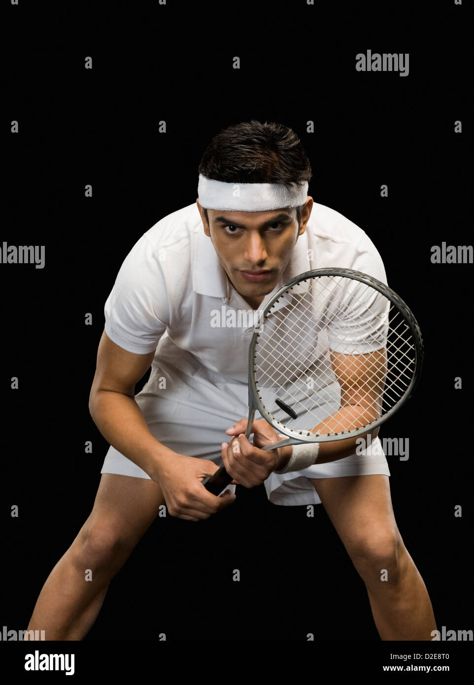 Tennis player practicing with a tennis racket Stock Photo - Alamy