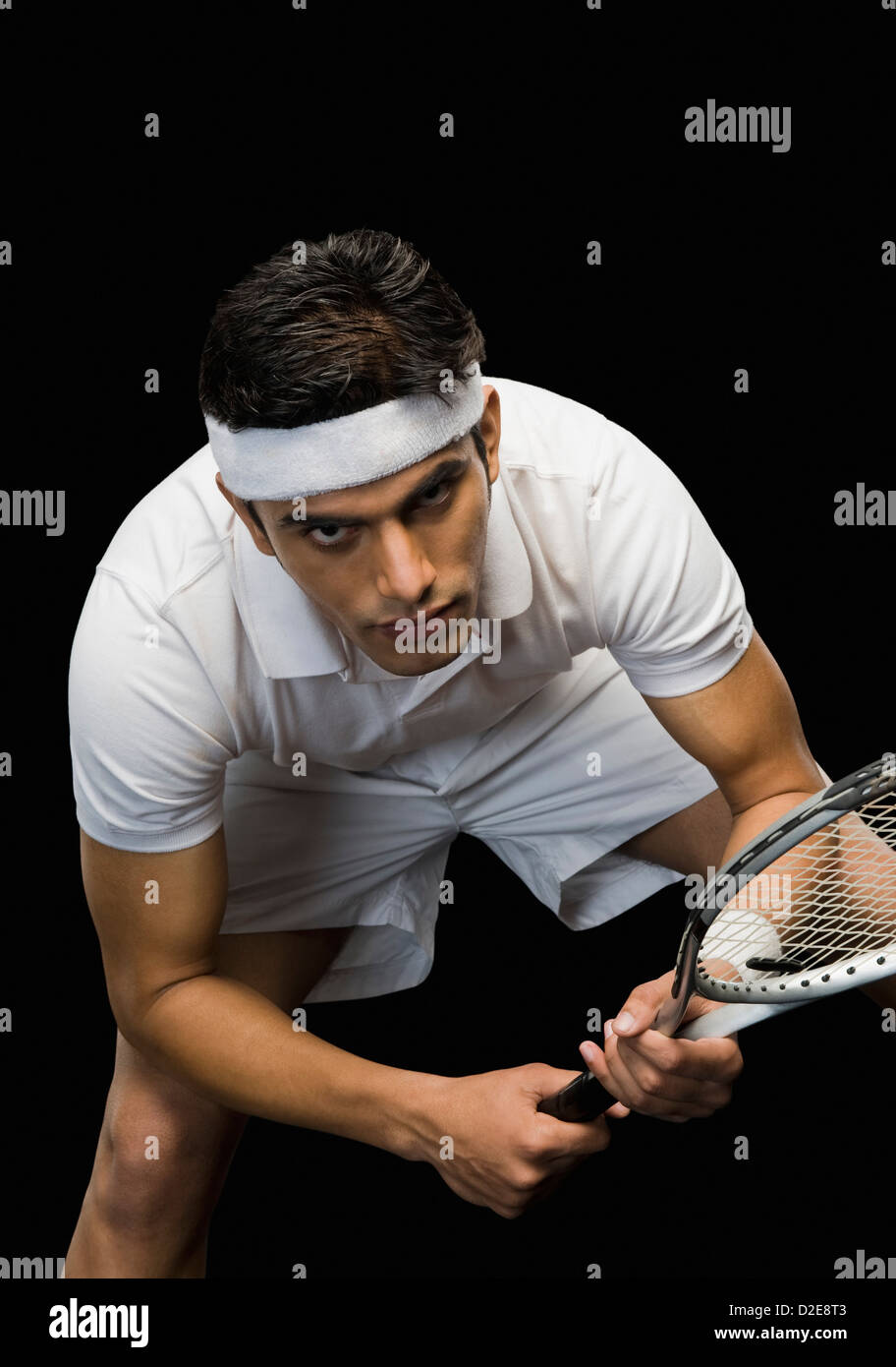 Tennis player practicing with a tennis racket Stock Photo - Alamy