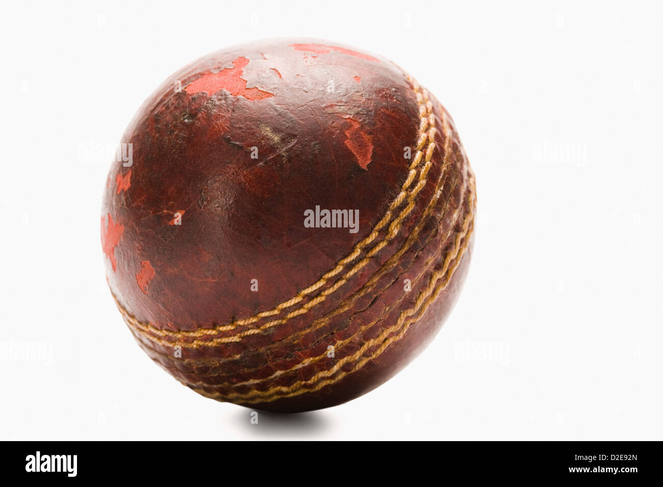 Close-up of an old cricket ball Stock Photo - Alamy
