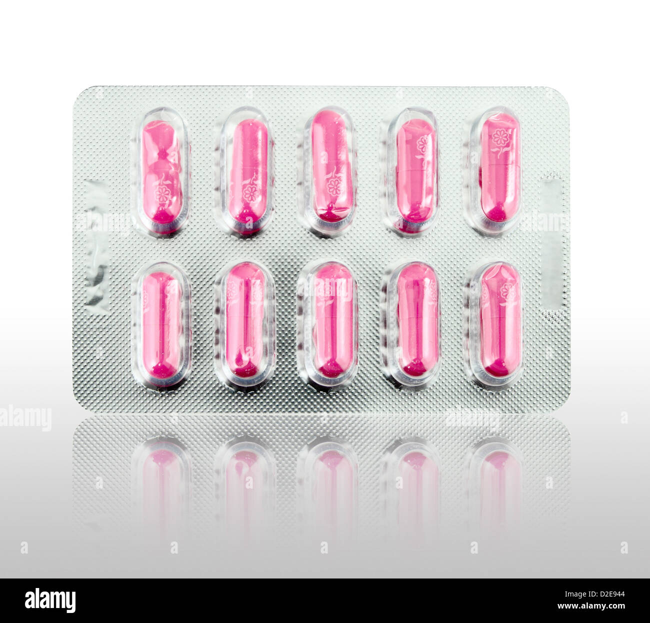 pink pills pack with shadow Stock Photo - Alamy