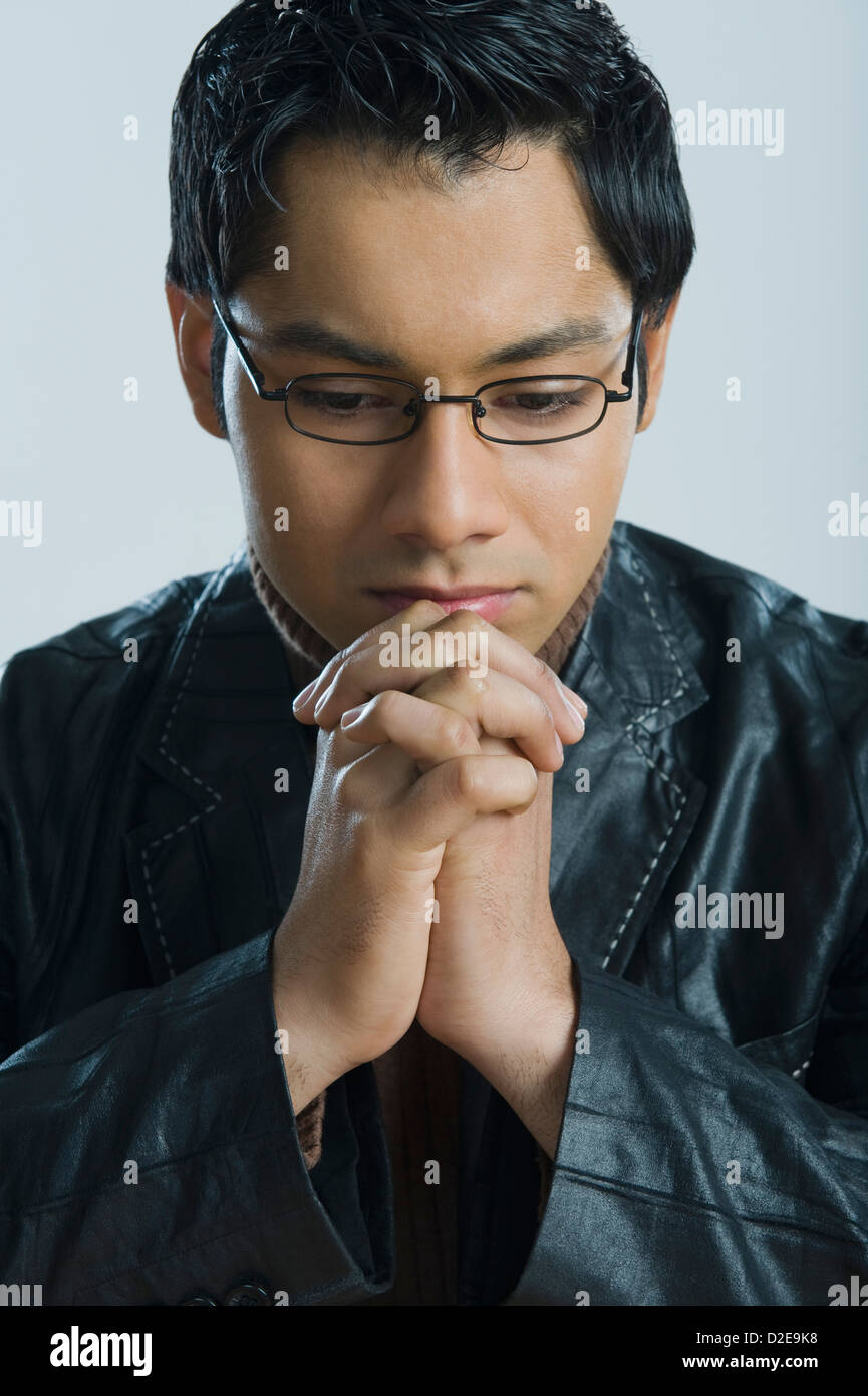 Close-up of a man thinking Stock Photo - Alamy