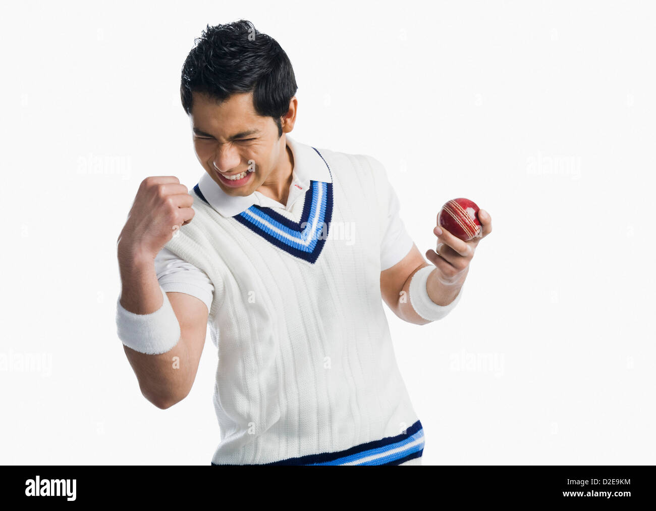 Cricket bowler celebrating his success Stock Photo - Alamy