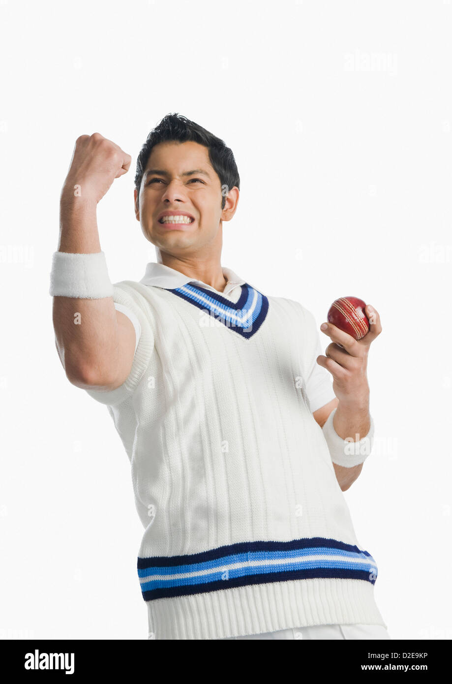 Cricket bowler celebrating his success Stock Photo - Alamy