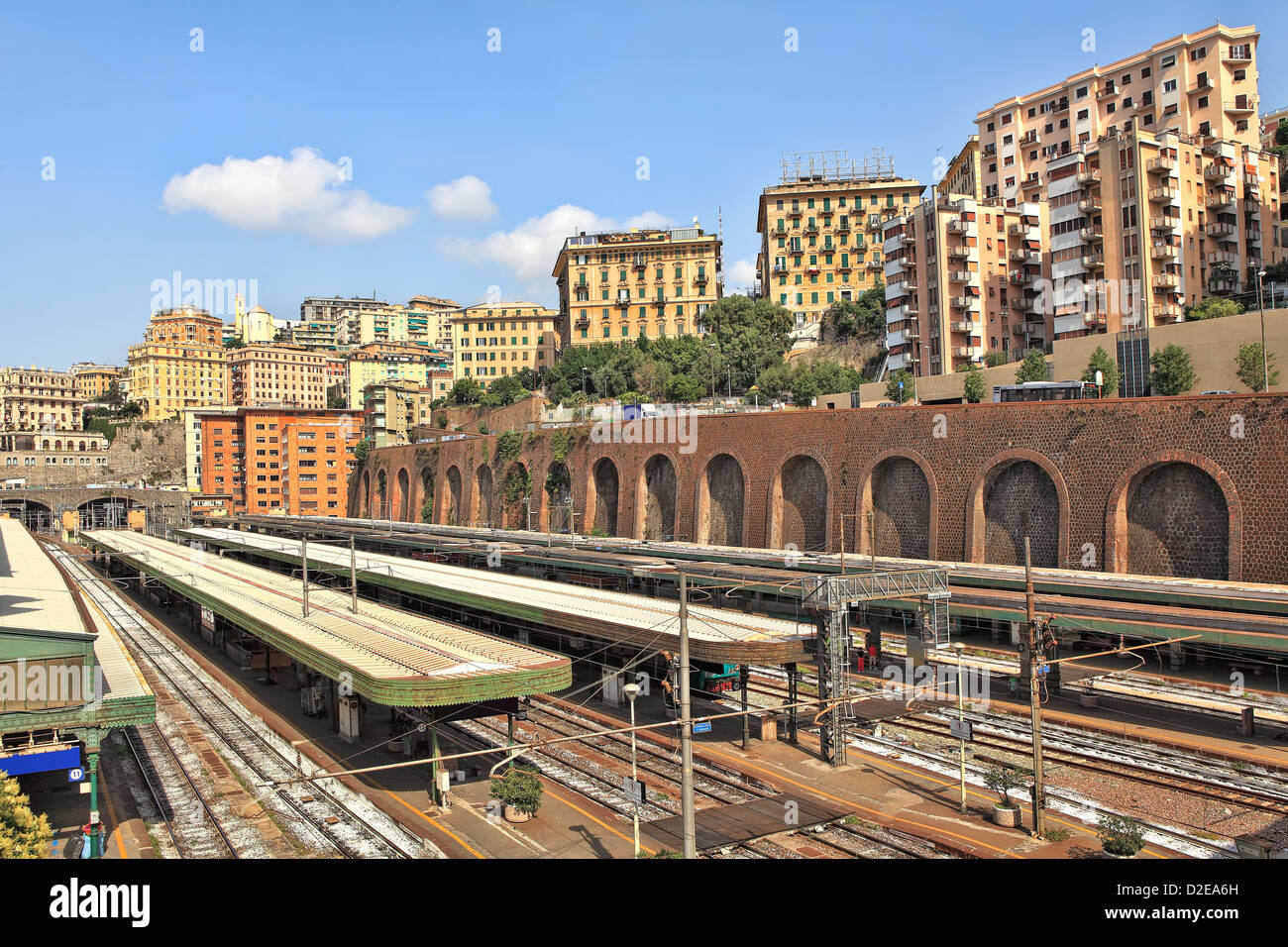 View on platforms at railway central station and residential urban ...