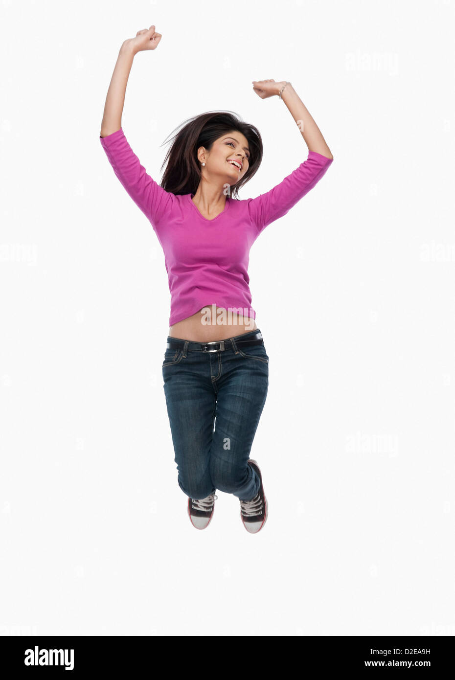 Close-up of a woman jumping Stock Photo - Alamy