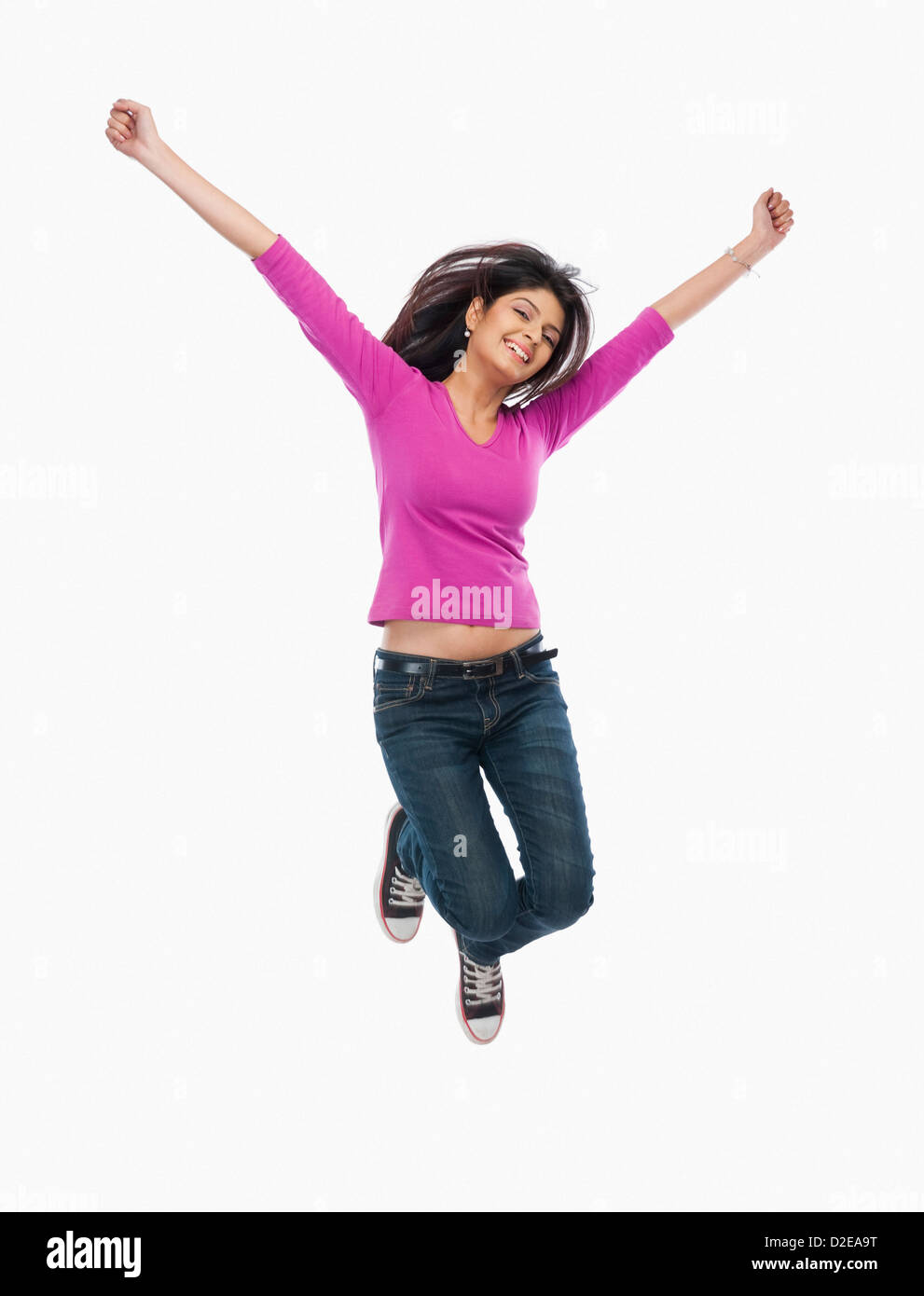 Close-up of a woman jumping Stock Photo - Alamy