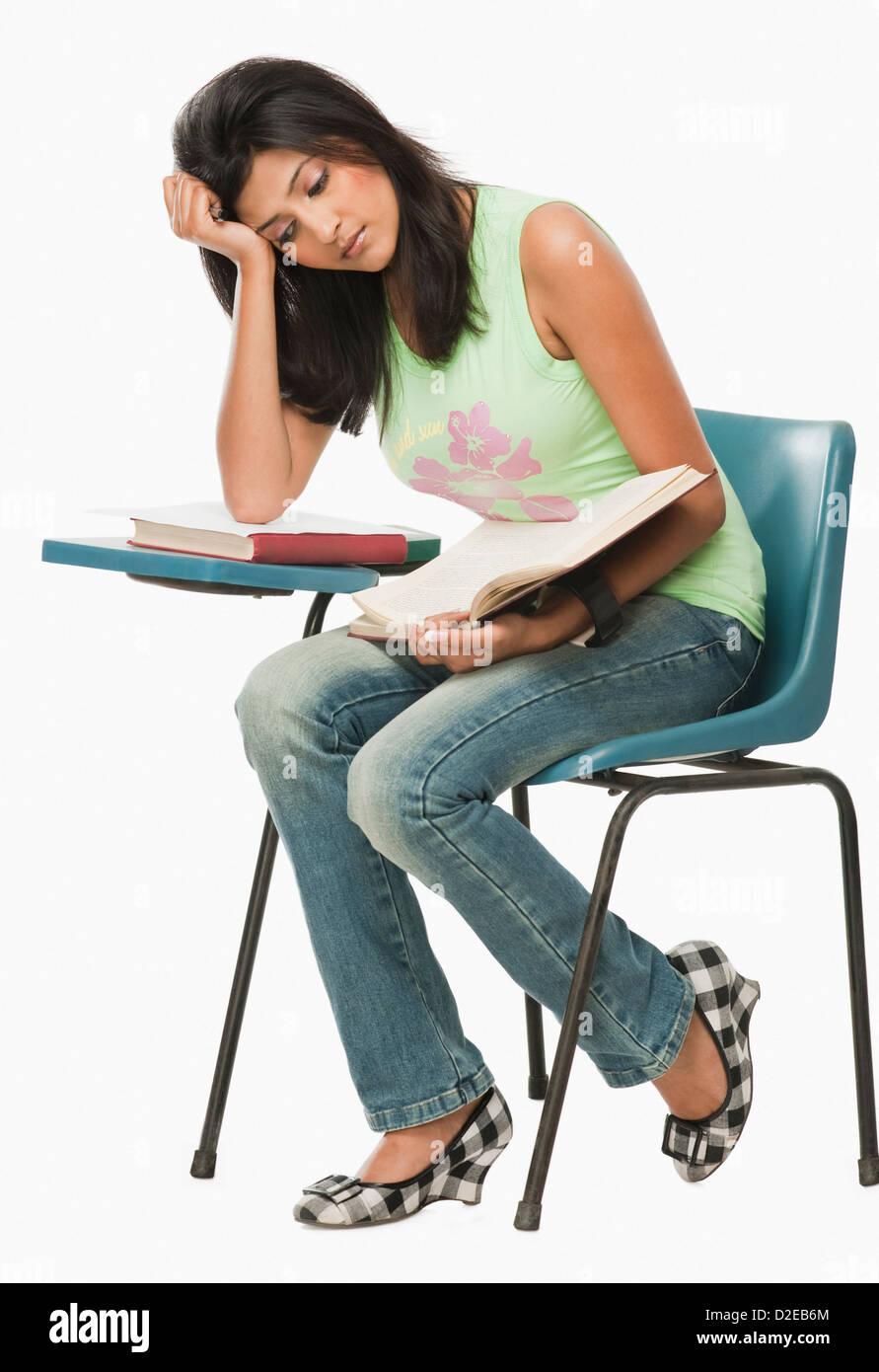 University student looking sad in a classroom Stock Photo - Alamy