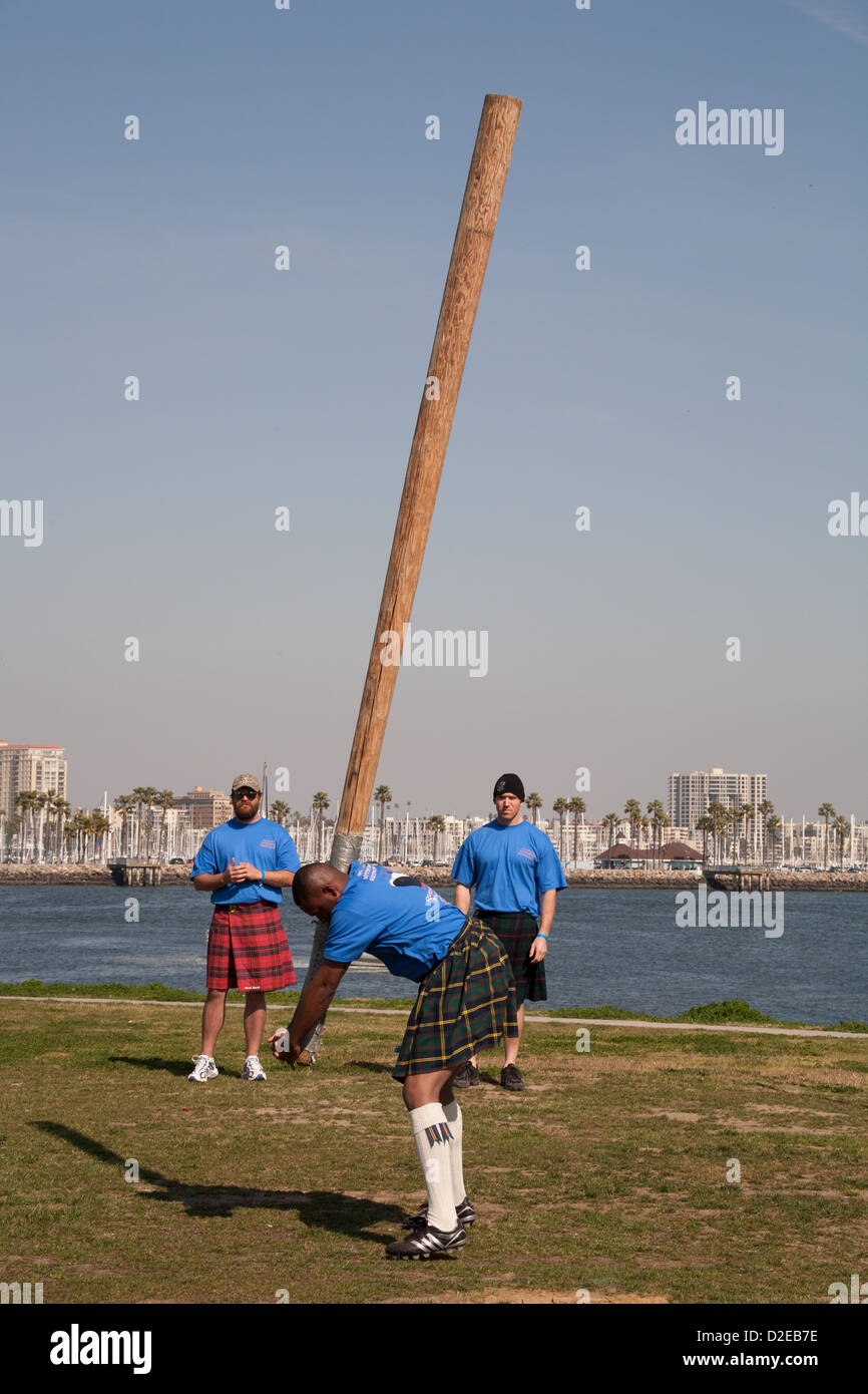 The caber toss competition at the Scotsfest Scottish Festival and clan ...