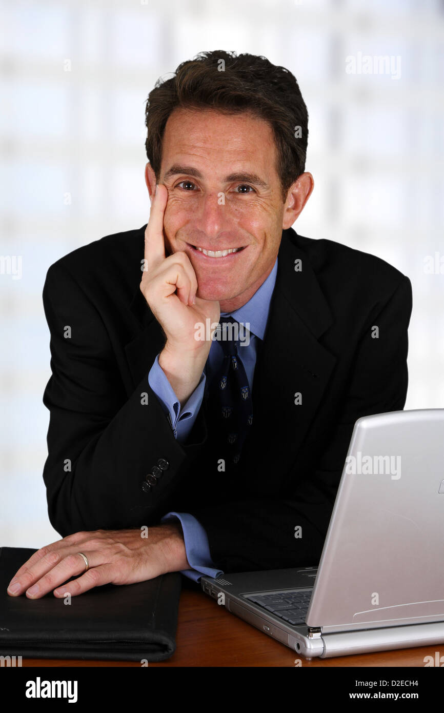 Caucasian business man working in his office Stock Photo - Alamy