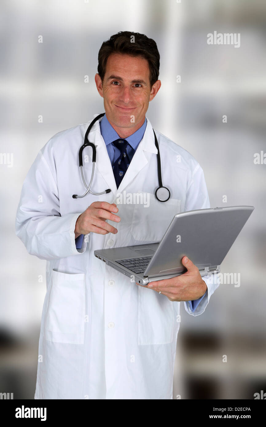 Caucasian male doctor working in a hospital Stock Photo - Alamy