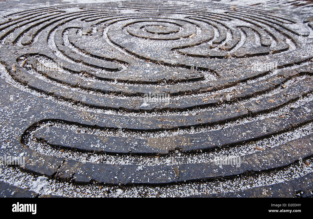 Labarinth or maze with a scattering of snow on it Stock Photo - Alamy