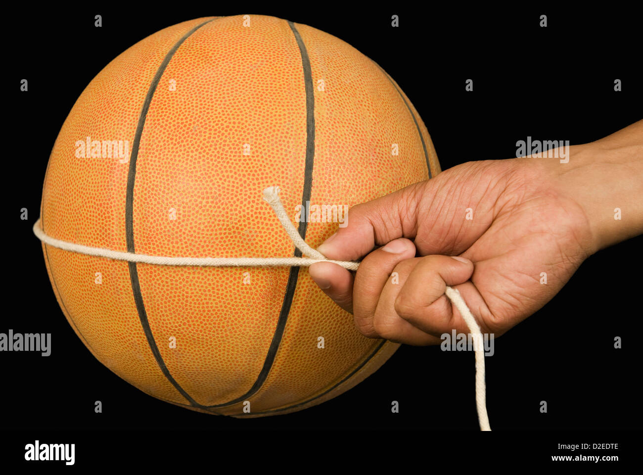 Close-up of a man measuring a curved surface with a string Stock Photo ...