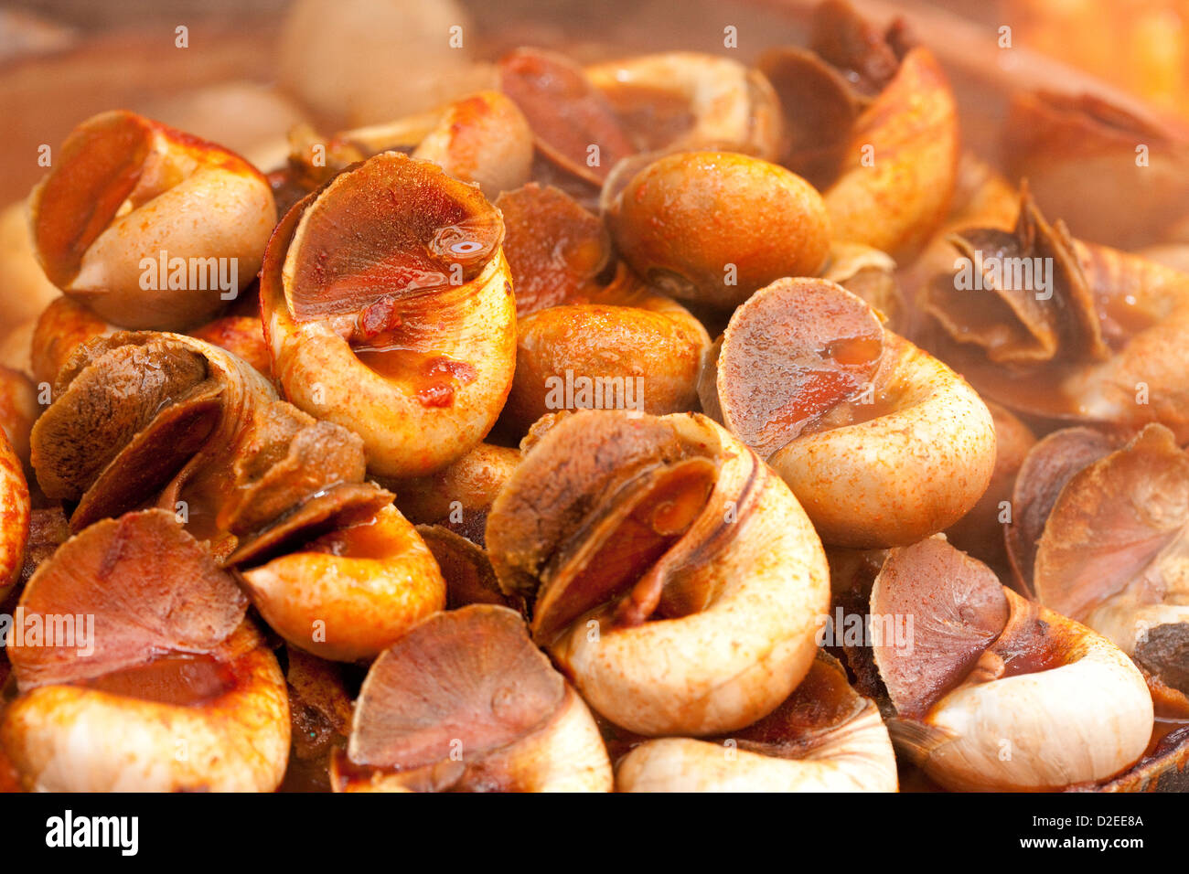 Chinese traditional snack cooked escargots Stock Photo - Alamy