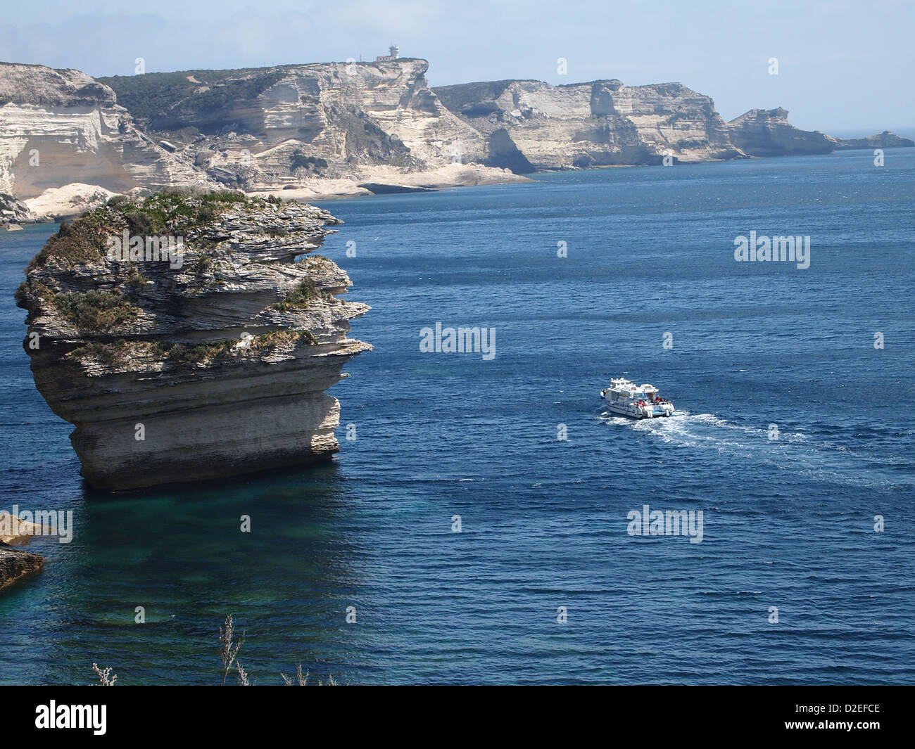An interesting rock in a bay Stock Photo - Alamy