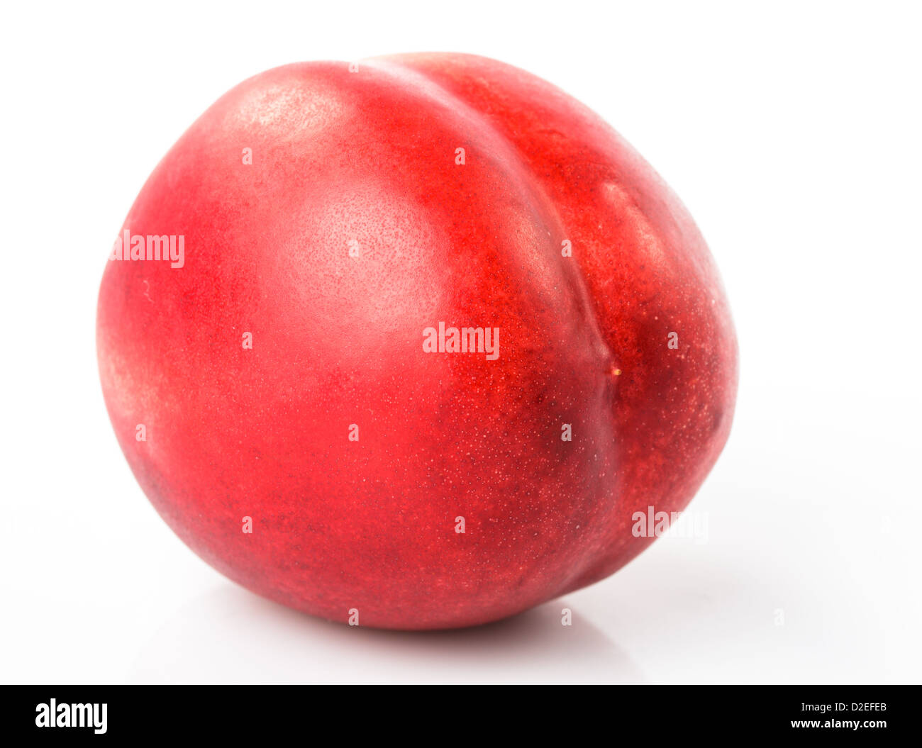 Nectarine fruit close up on white background Stock Photo - Alamy