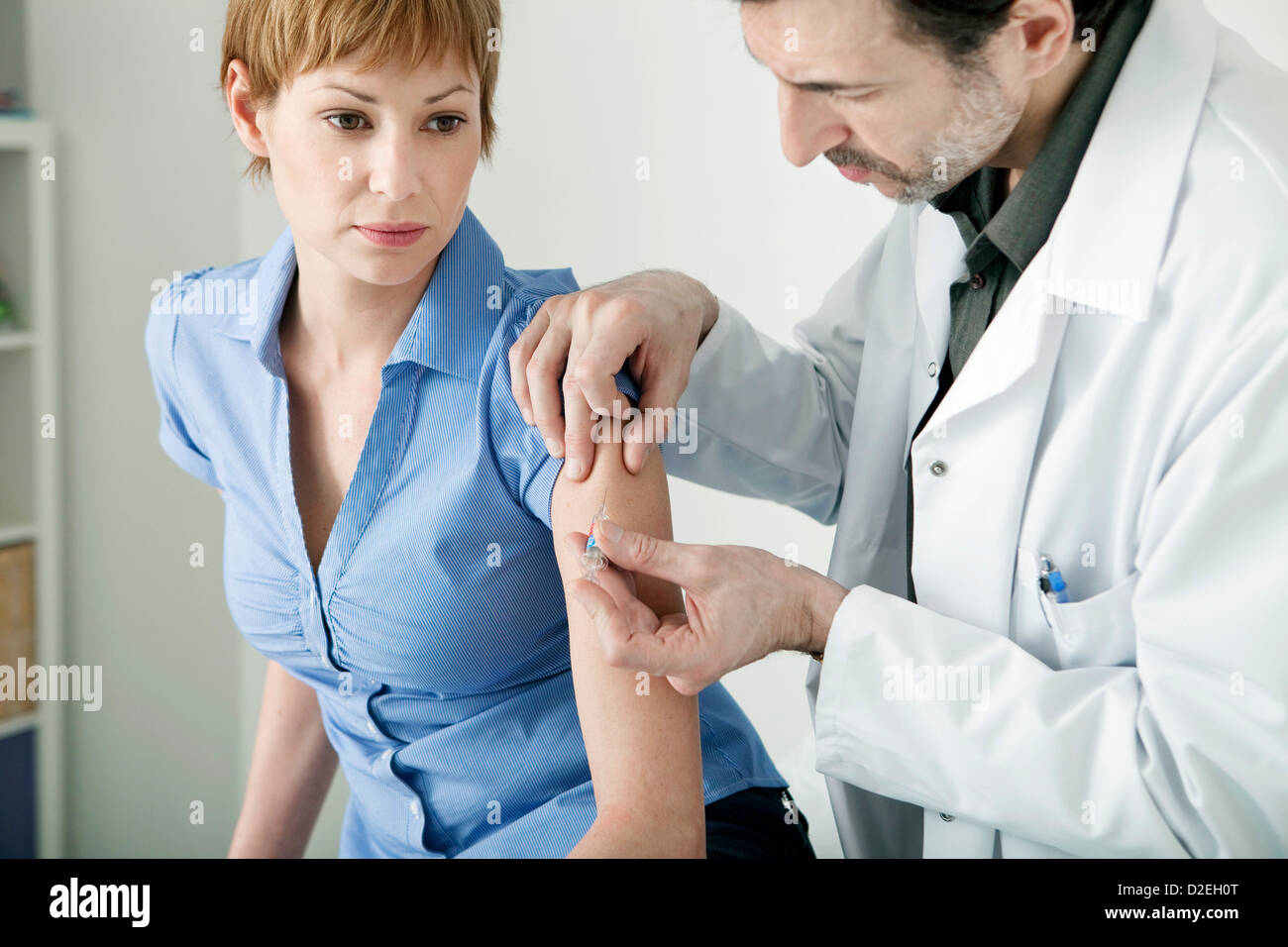 Vaccination woman hi-res stock photography and images - Alamy