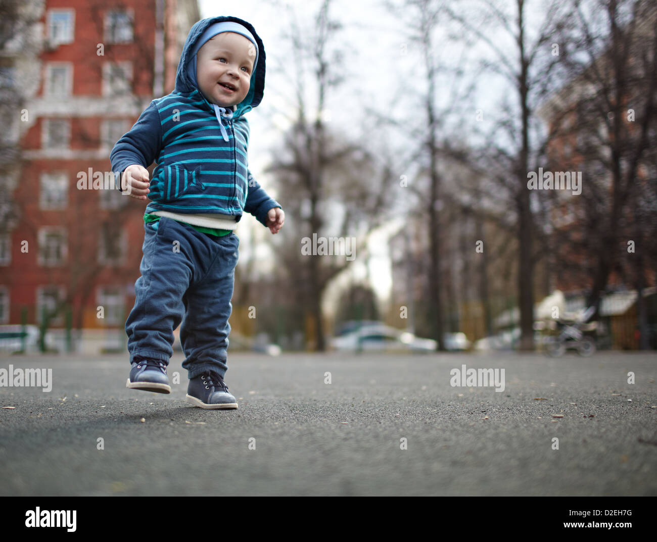 The first independent steps of the kid. Natural colors, shallow dof ...