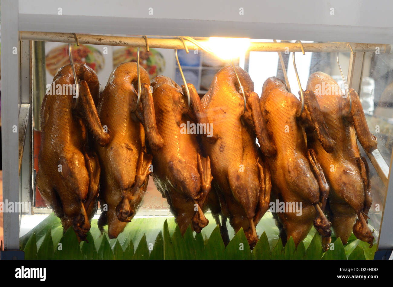Pot-stewed Duck on glass food cupboard at Thai native market Stock ...