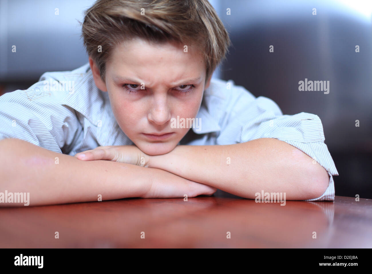 France, unhappy boy at home Stock Photo - Alamy