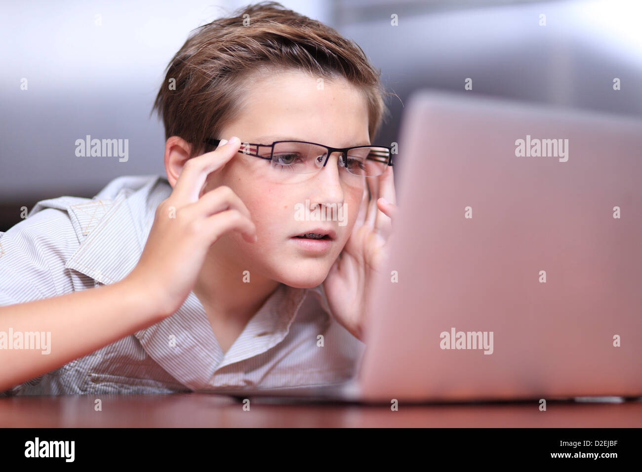 France, young boy with a computer Stock Photo - Alamy