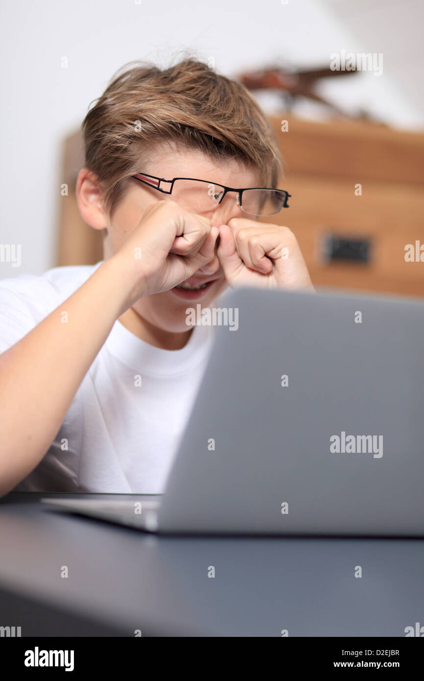 France, young boy with a computer Stock Photo - Alamy