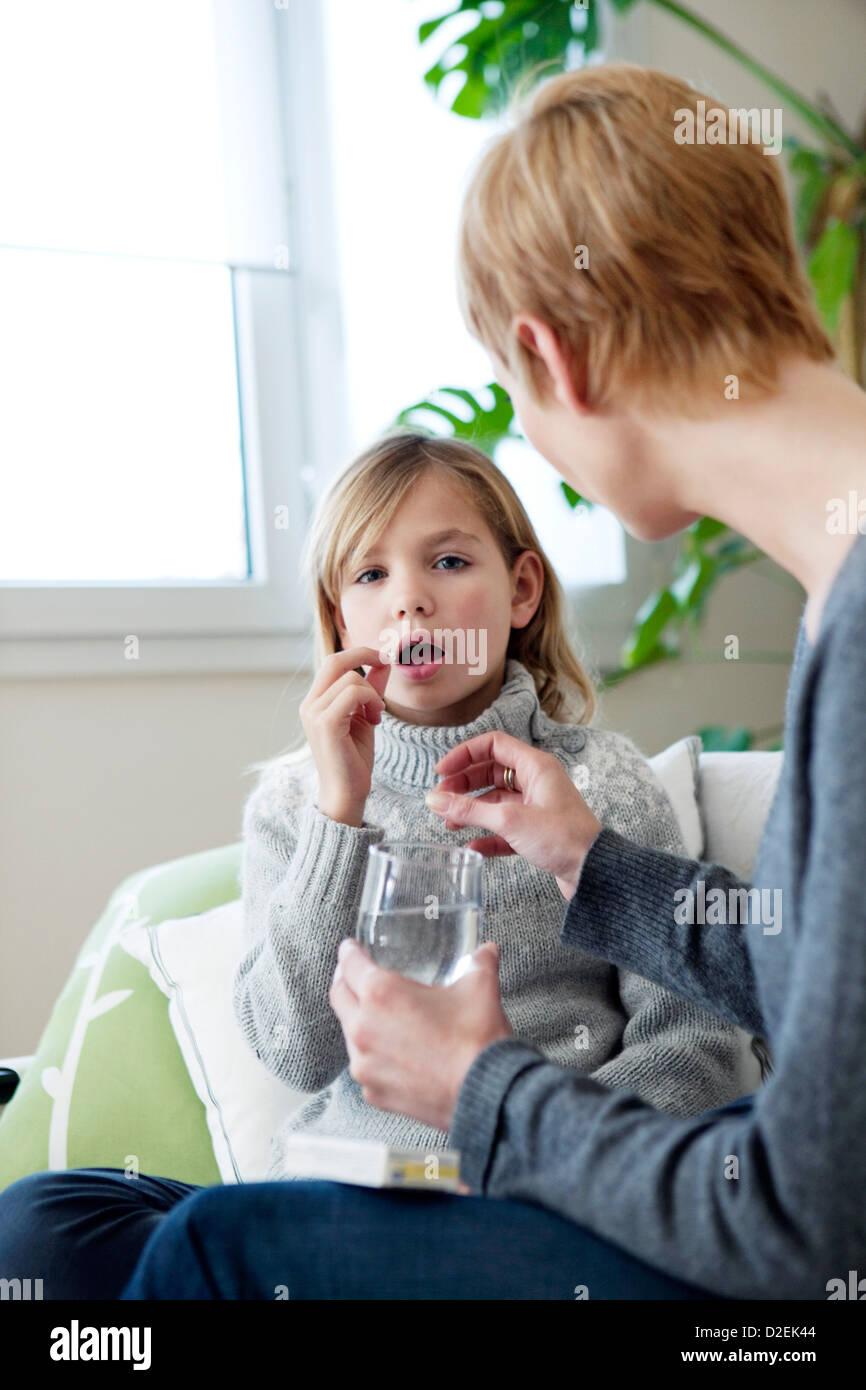 CHILD TAKING MEDICATION Stock Photo - Alamy