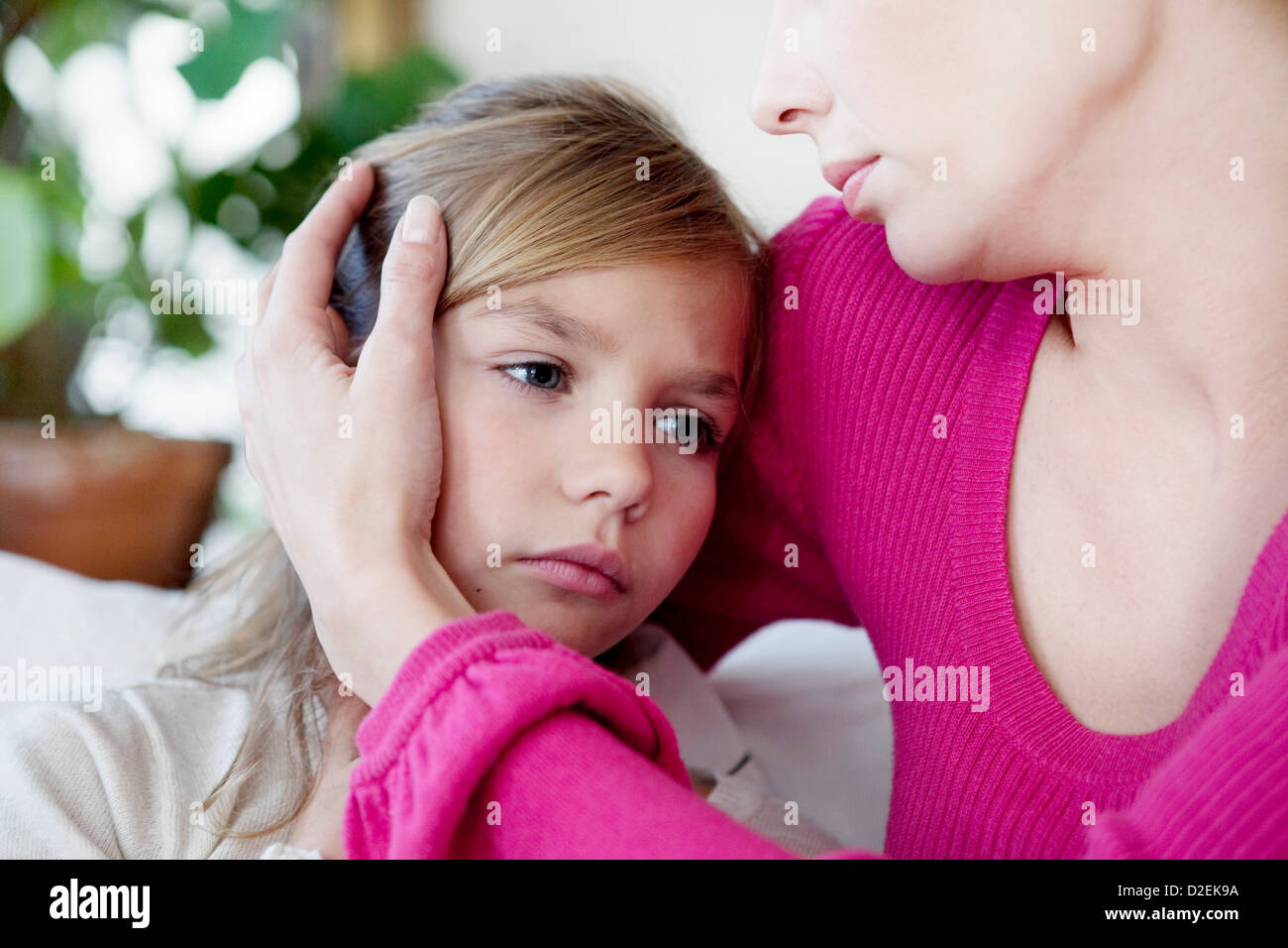 Sick mother hugging children hi-res stock photography and images - Alamy