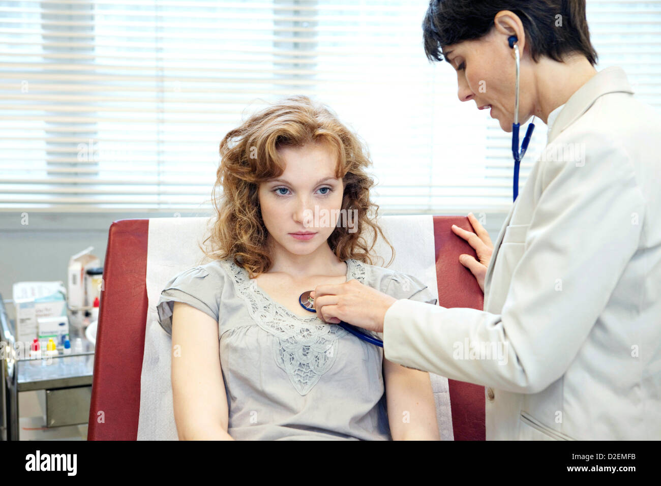 Auscultation woman hi-res stock photography and images - Alamy