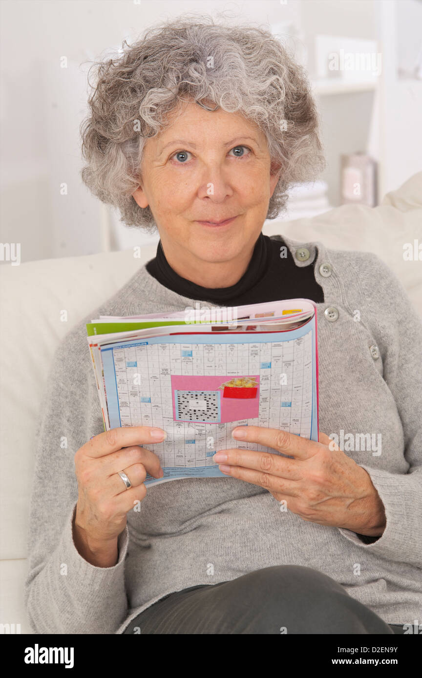 ELDERLY PERSON READING Stock Photo - Alamy