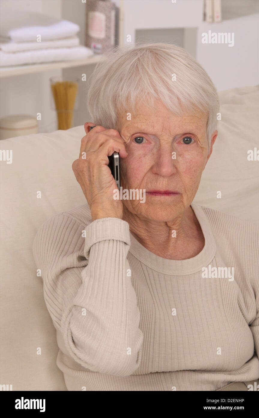 ELDERLY PERSON ON THE PHONE Stock Photo - Alamy
